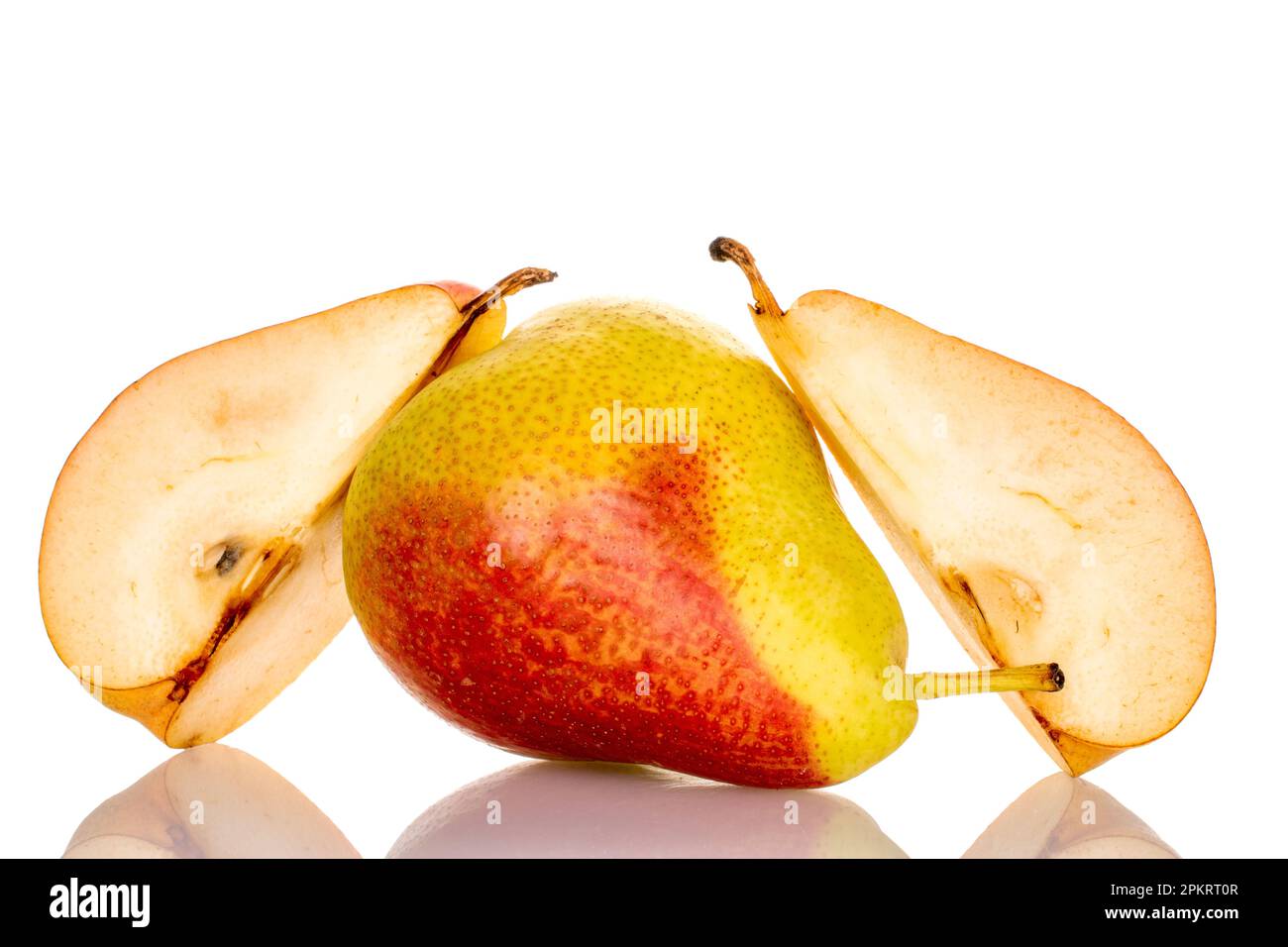 Whole pears and slices, close-up, on a white background Stock Photo - Alamy