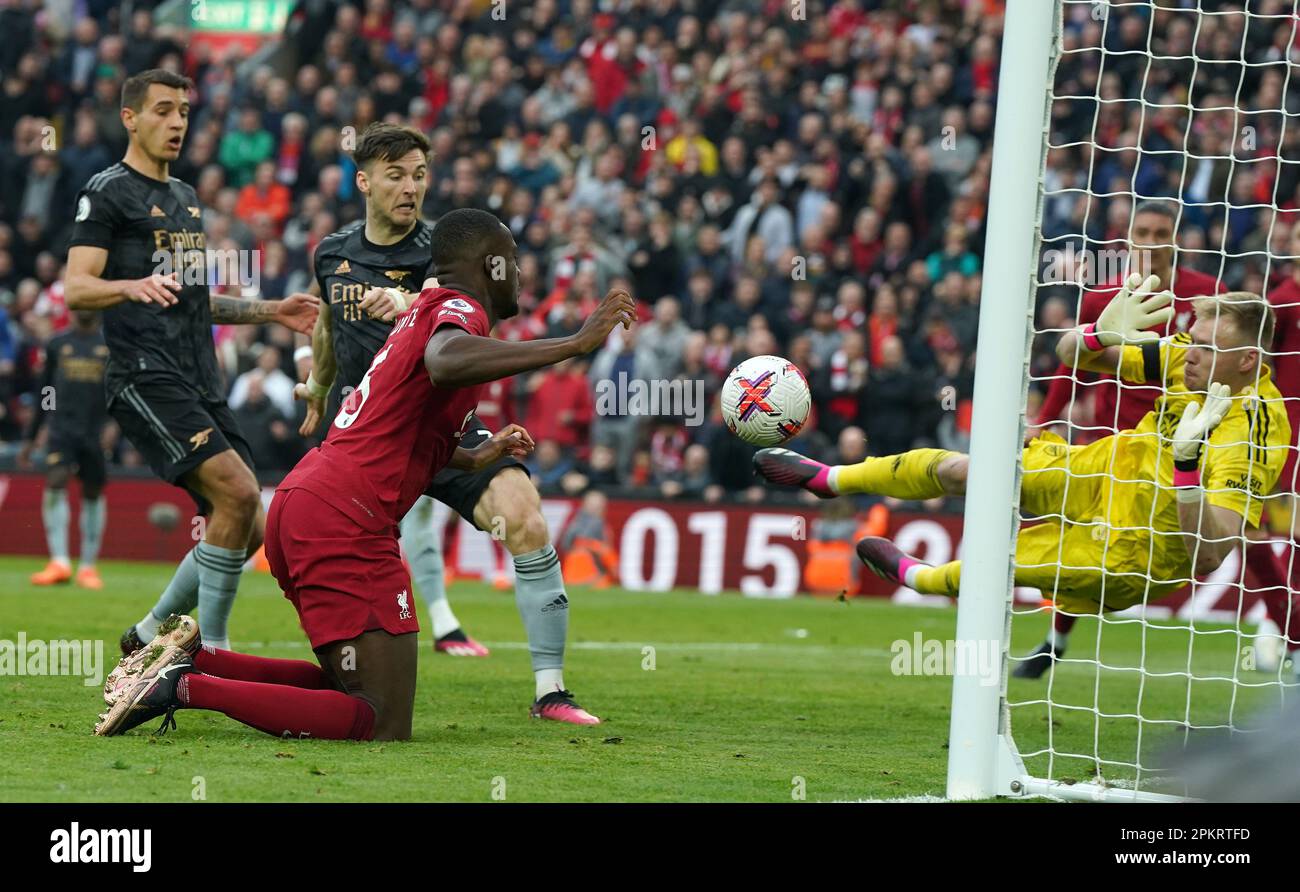 Arsenal goalkeeper Aaron Ramsdale saves from Liverpool's Ibrahima ...