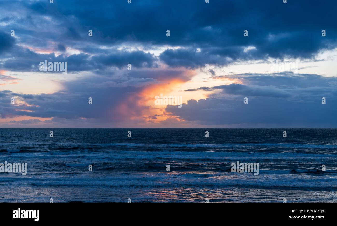 Vibrant colors and contrast tones of sunset at Pacific Northwest ocean ...