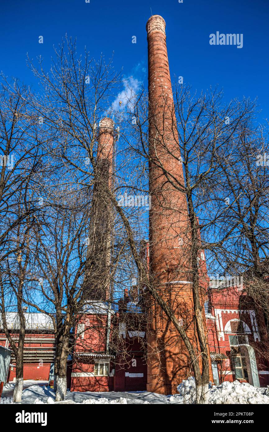 Red brick chimneys of an old factory in Moscow, Russia Stock Photo - Alamy