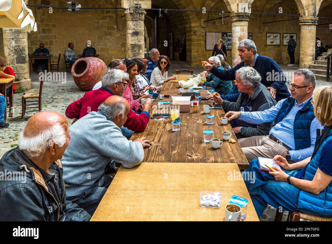 Long row of tables at Büyük Han, the large caravanserai in the old town ...