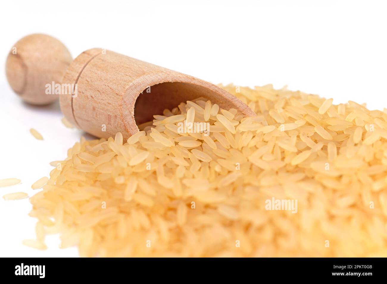 Rice grains isolated against white background Stock Photo - Alamy
