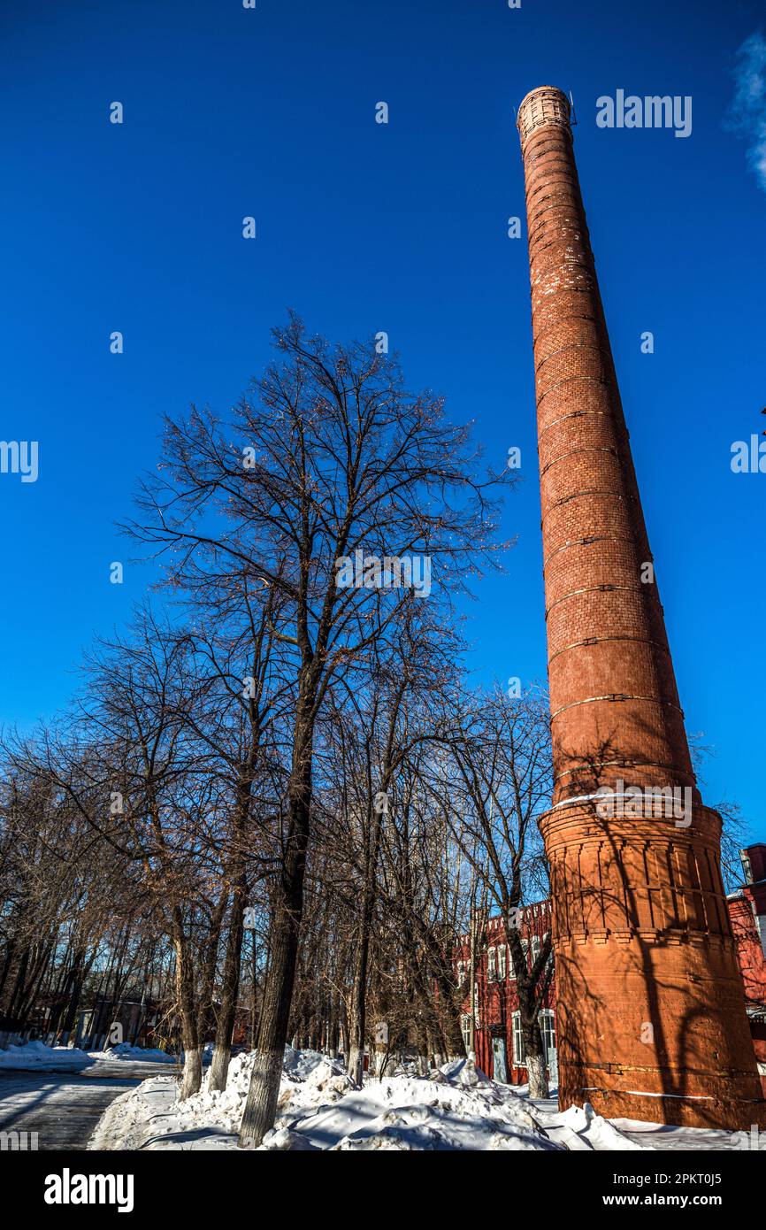 Red brick chimneys of an old factory in Moscow, Russia Stock Photo - Alamy