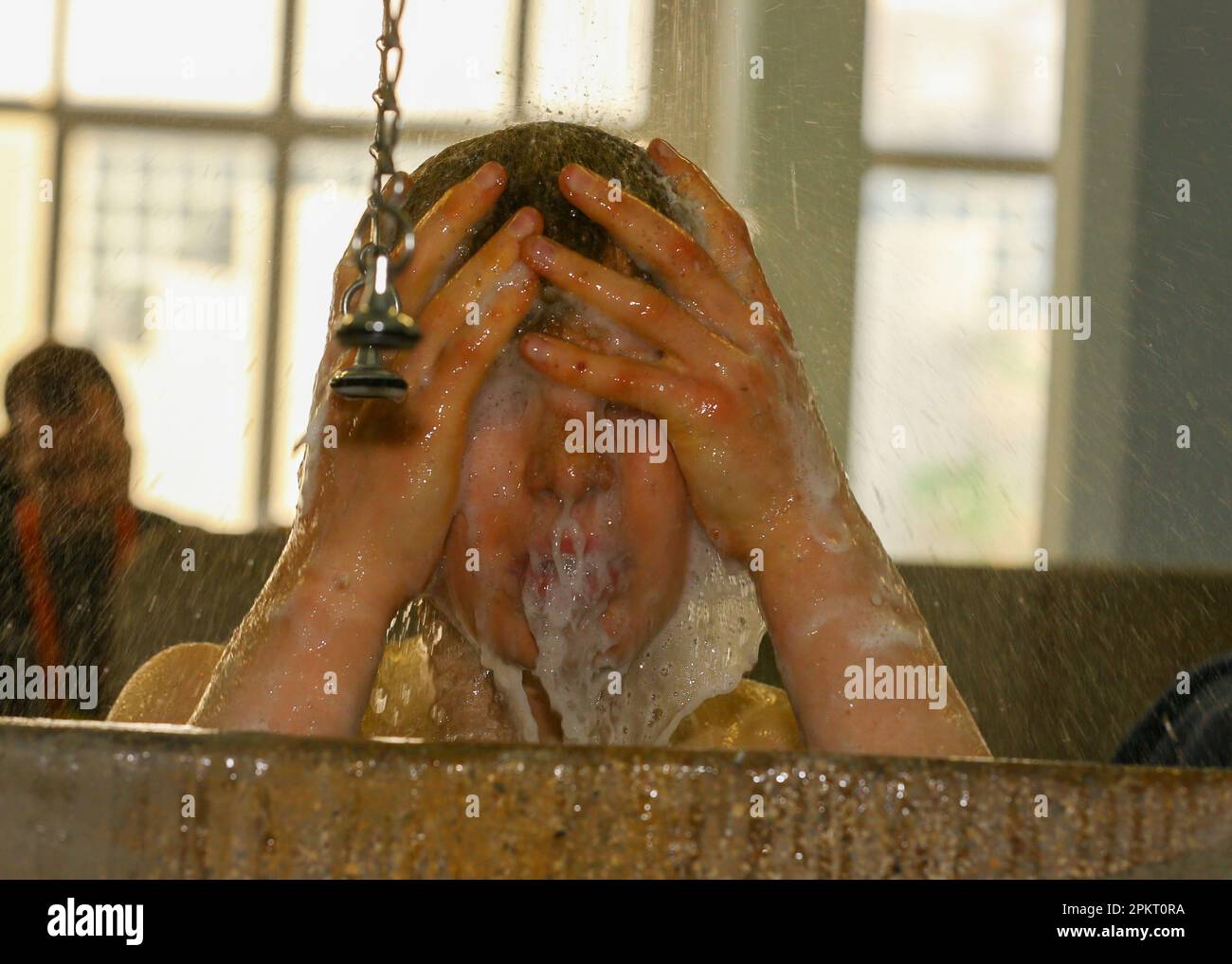 Compeigne, Roubaix, France. 9th April, 2023. A rider washing off the ...
