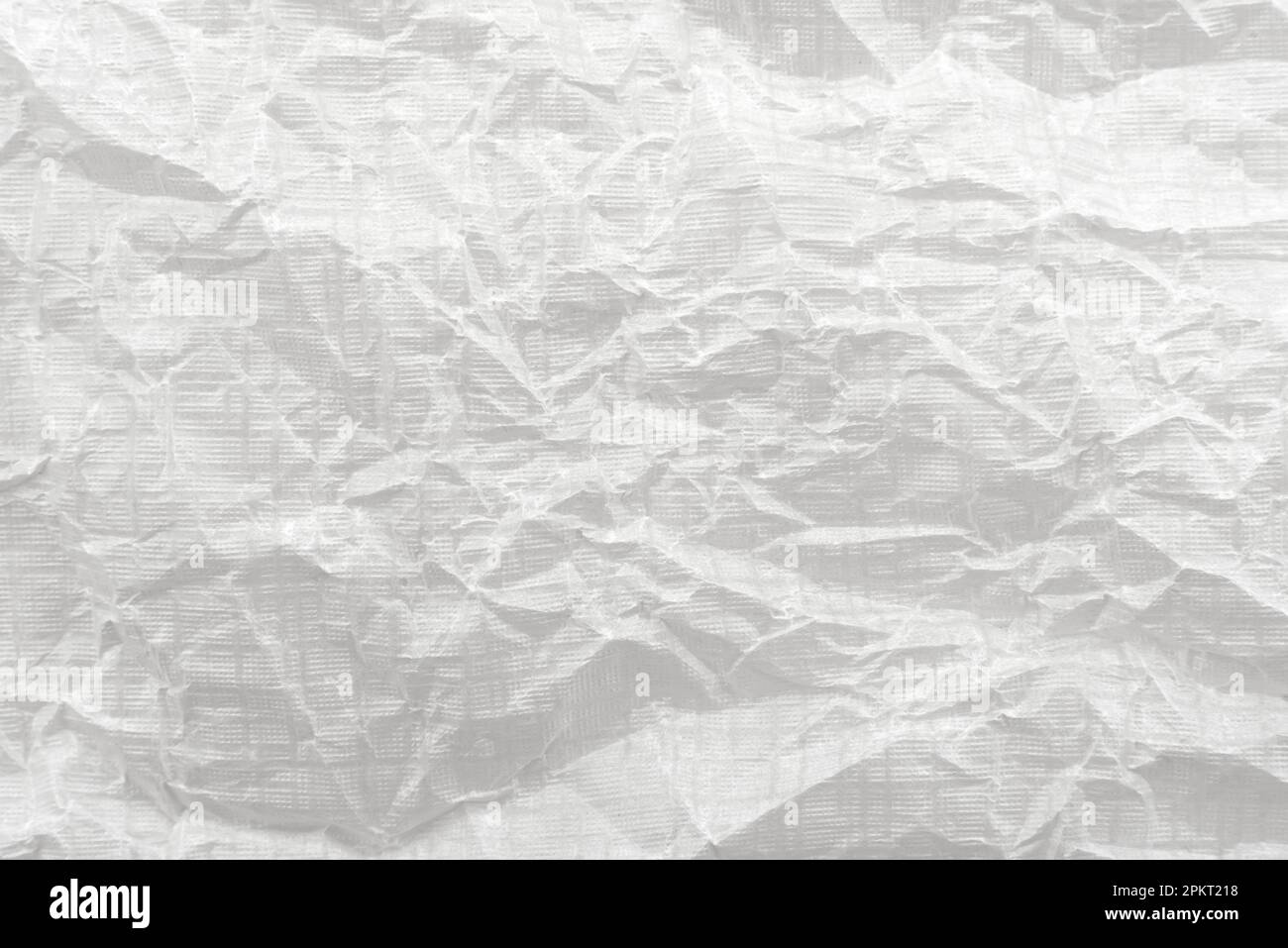 Sheet of white crumpled glossy paper. paper texture Stock Photo - Alamy
