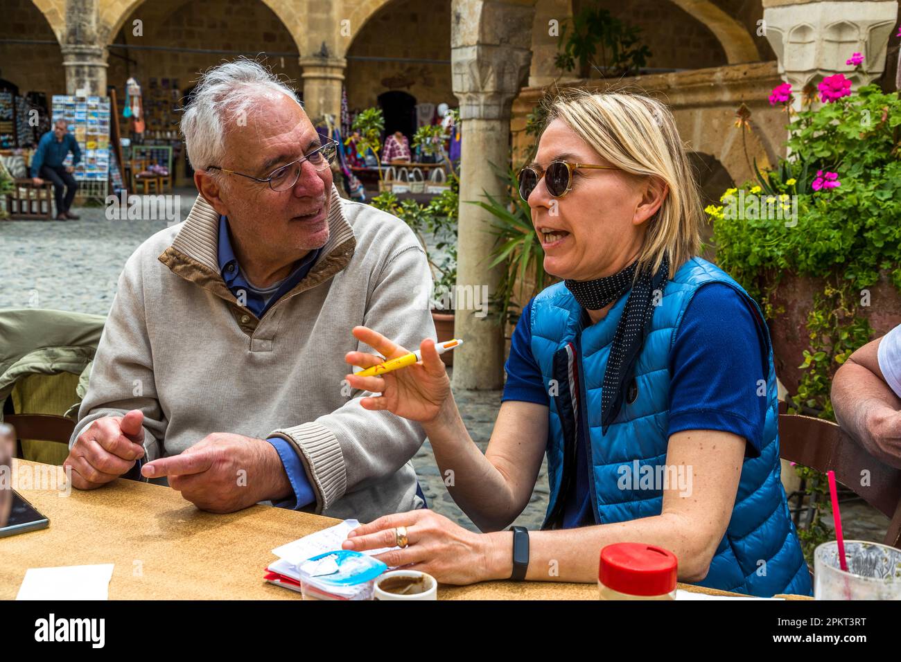 Angela Berg in conversation with Nikolaos, a Greek from Cyprus. His ...