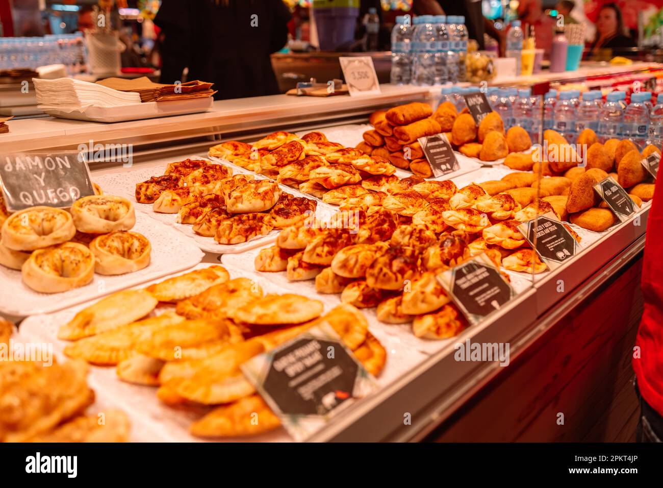 Pastry products on the market stall. Different semi healthy pastries ...