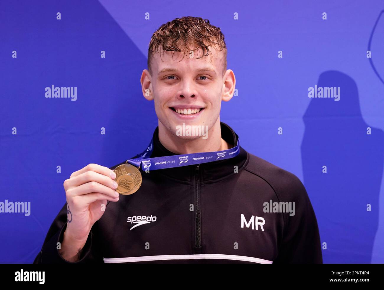 Matthew Richards poses with his gold medal after winning the Men's 200m ...