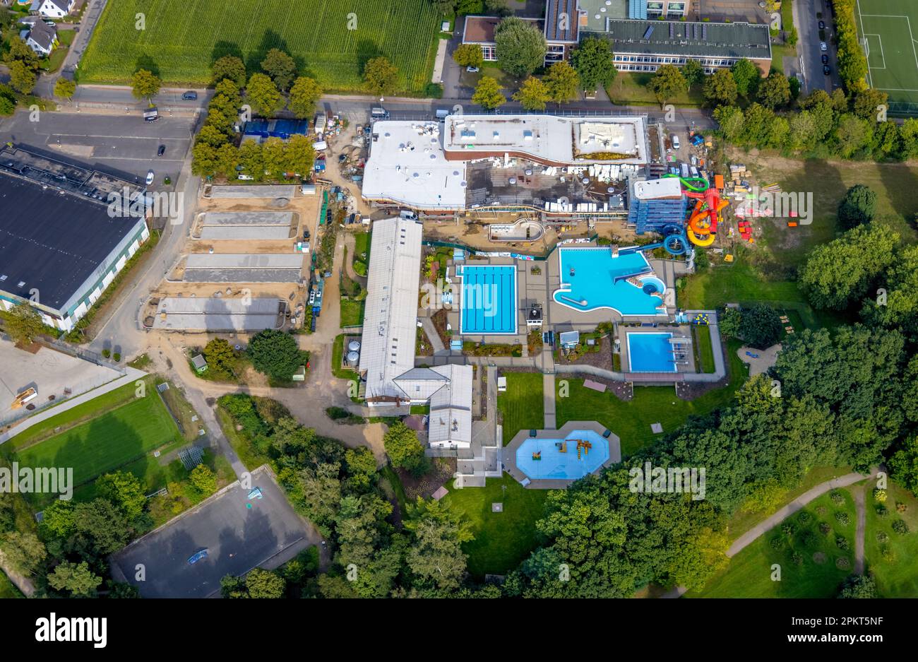 Aerial view, construction site and new building of indoor swimming pool ...