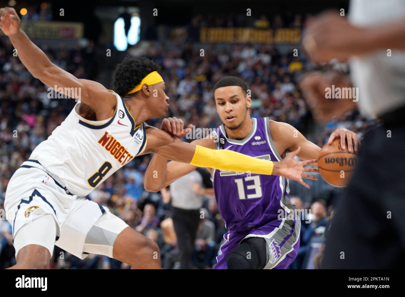 Denver Nuggets forward Peyton Watson, left, defends as Sacramento Kings ...
