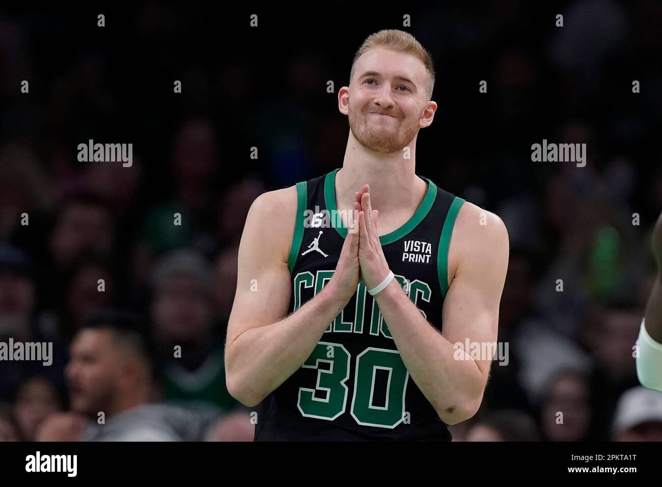 Boston Celtics forward Sam Hauser (30) reacts after the Celtics scored ...