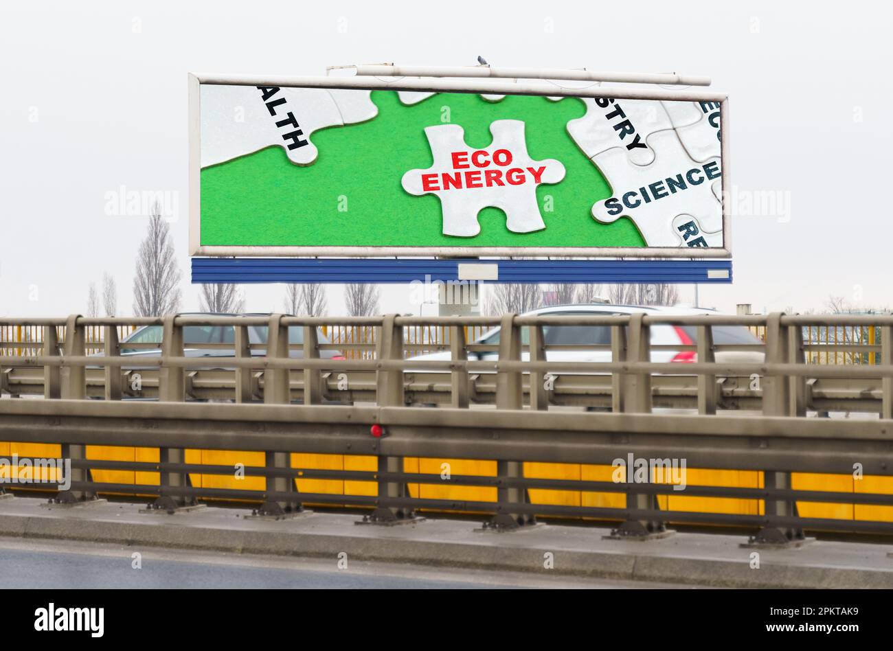 Ecological concept. On the highway there is an advertising billboard ...