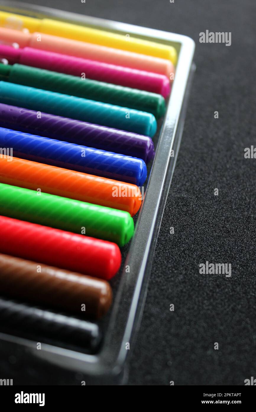 Top Parts Of Multi Colored Markers Stacked In Tray Vertical Stock Photo ...