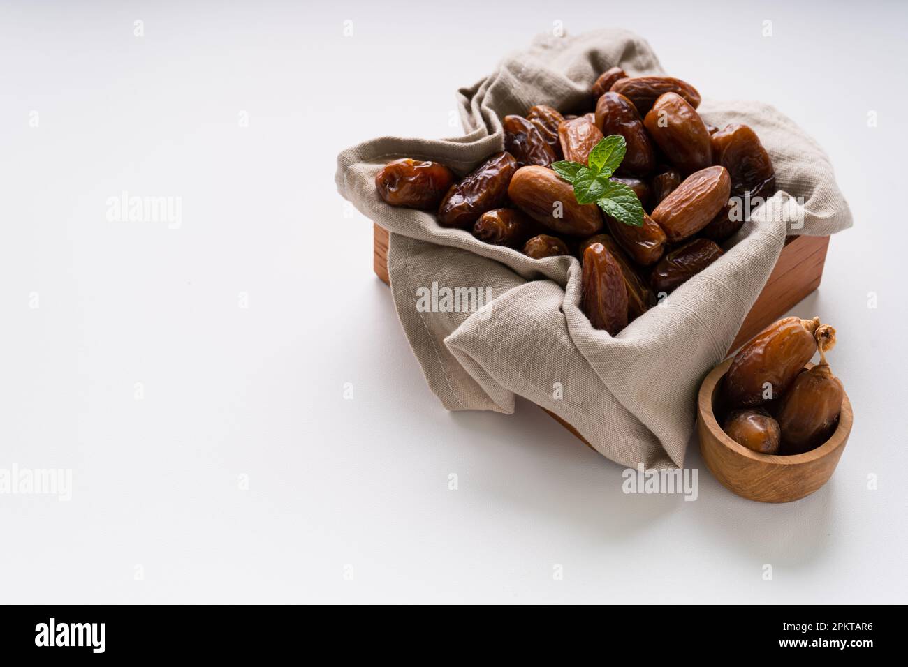 Fresh dried dates fruit on white isolated background Stock Photo - Alamy