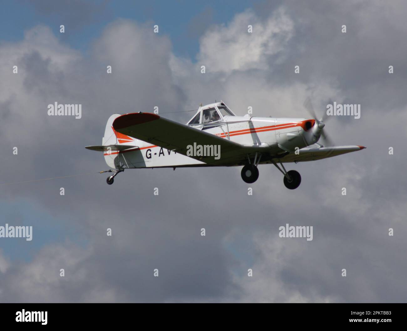 A Piper PA-25 Pawnee glider tug at work at a private airfield in West ...