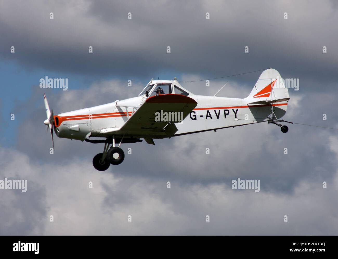 A Piper PA-25 Pawnee glider tug at work at a private airfield in West ...
