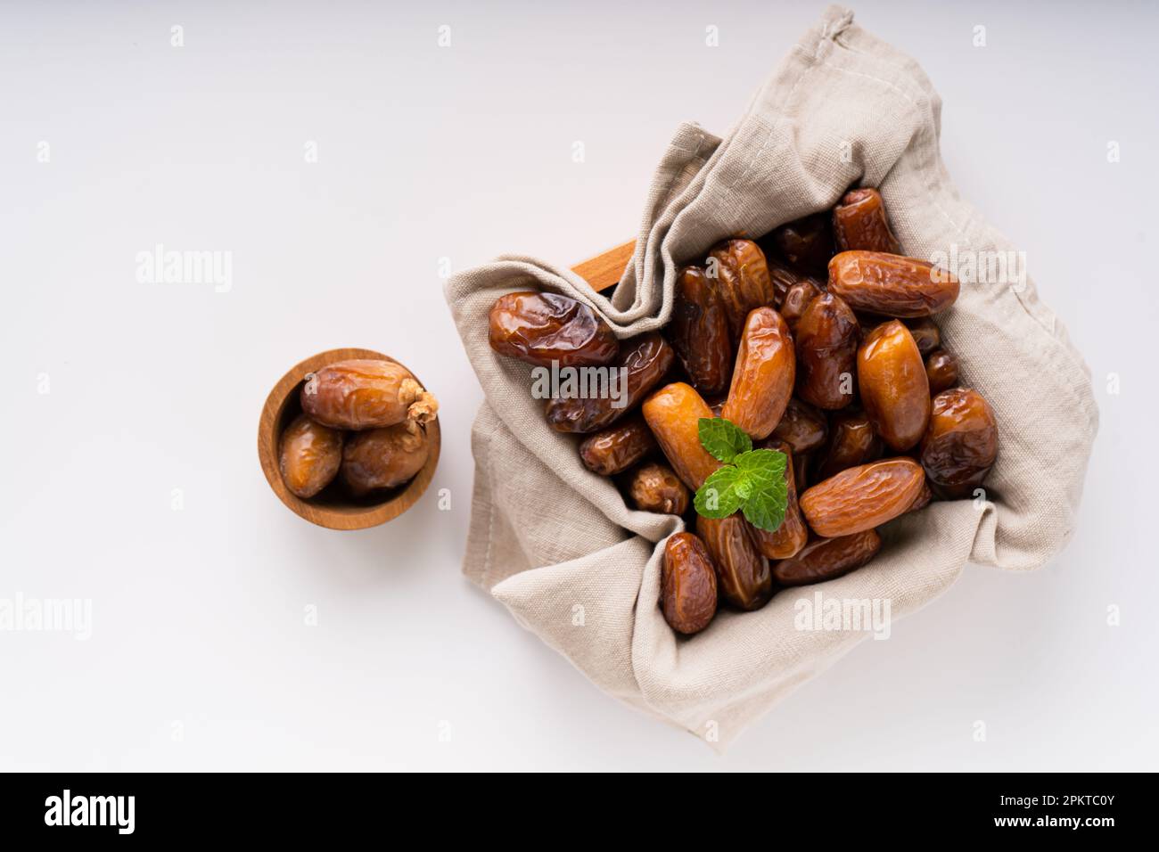 Fresh dried dates fruit on white isolated background Stock Photo - Alamy