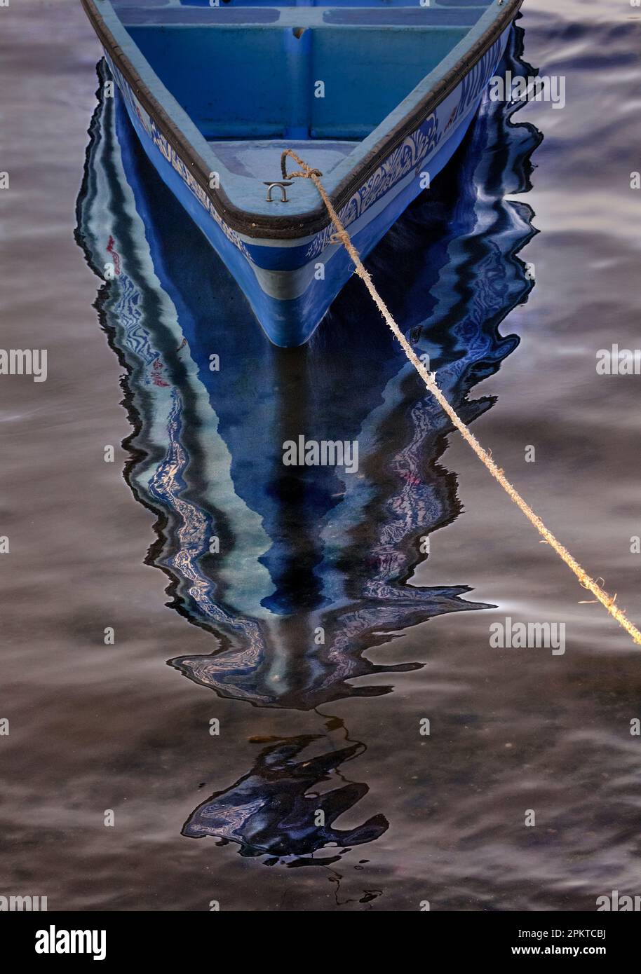 Boat reflections on Lamu Island Stock Photo - Alamy