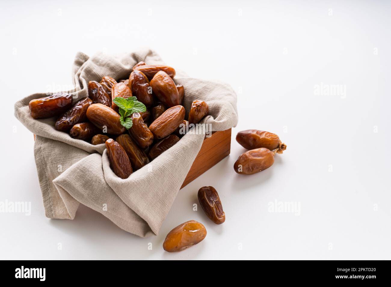 Fresh dried dates fruit on white isolated background Stock Photo - Alamy
