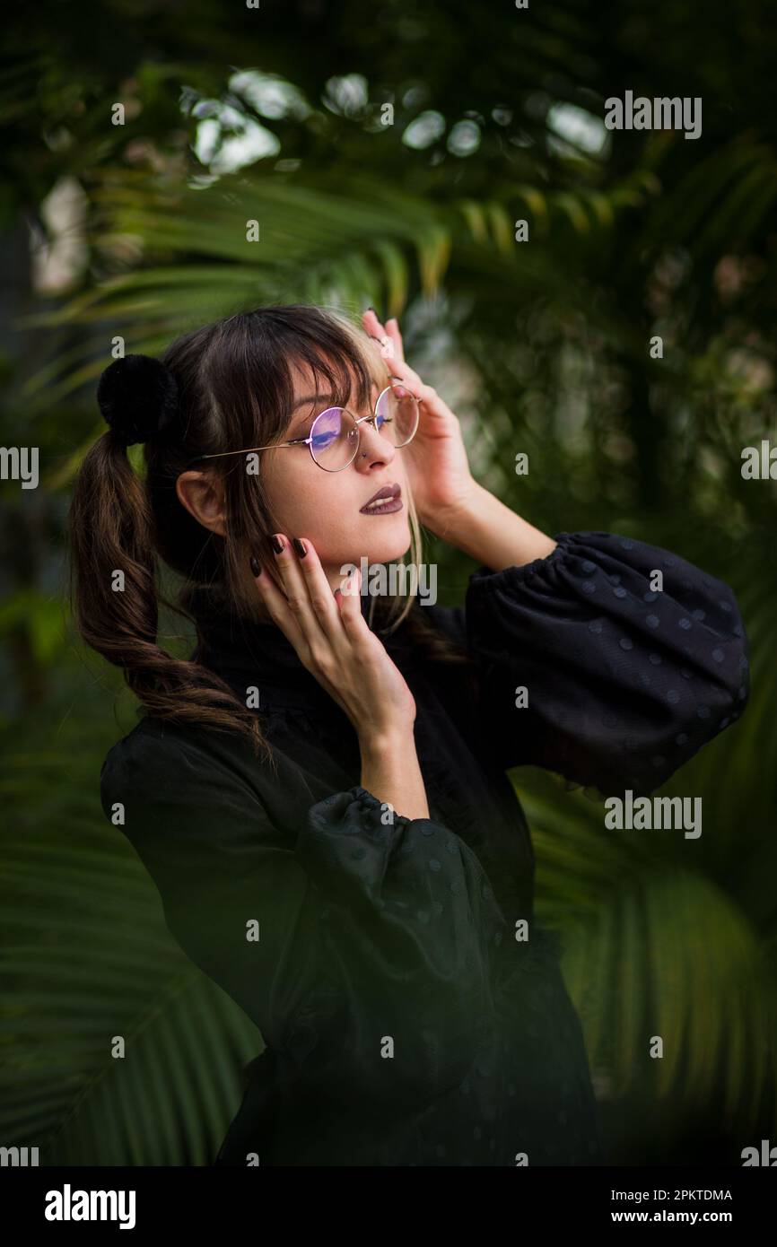 gothic lolita victorian cosplay costume. Hispanic young woman cheerful ...