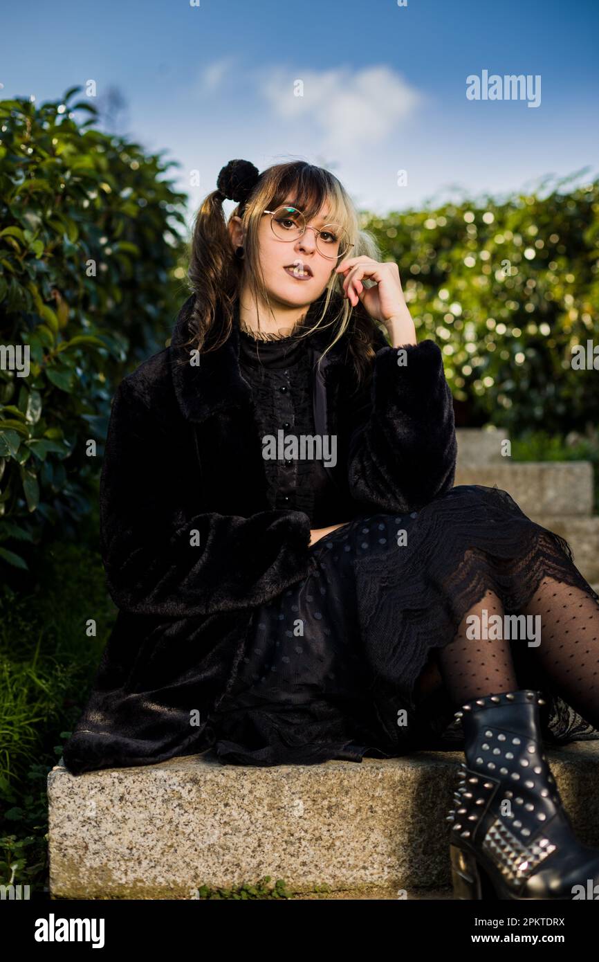 gothic lolita victorian cosplay costume. Hispanic young woman cheerful ...