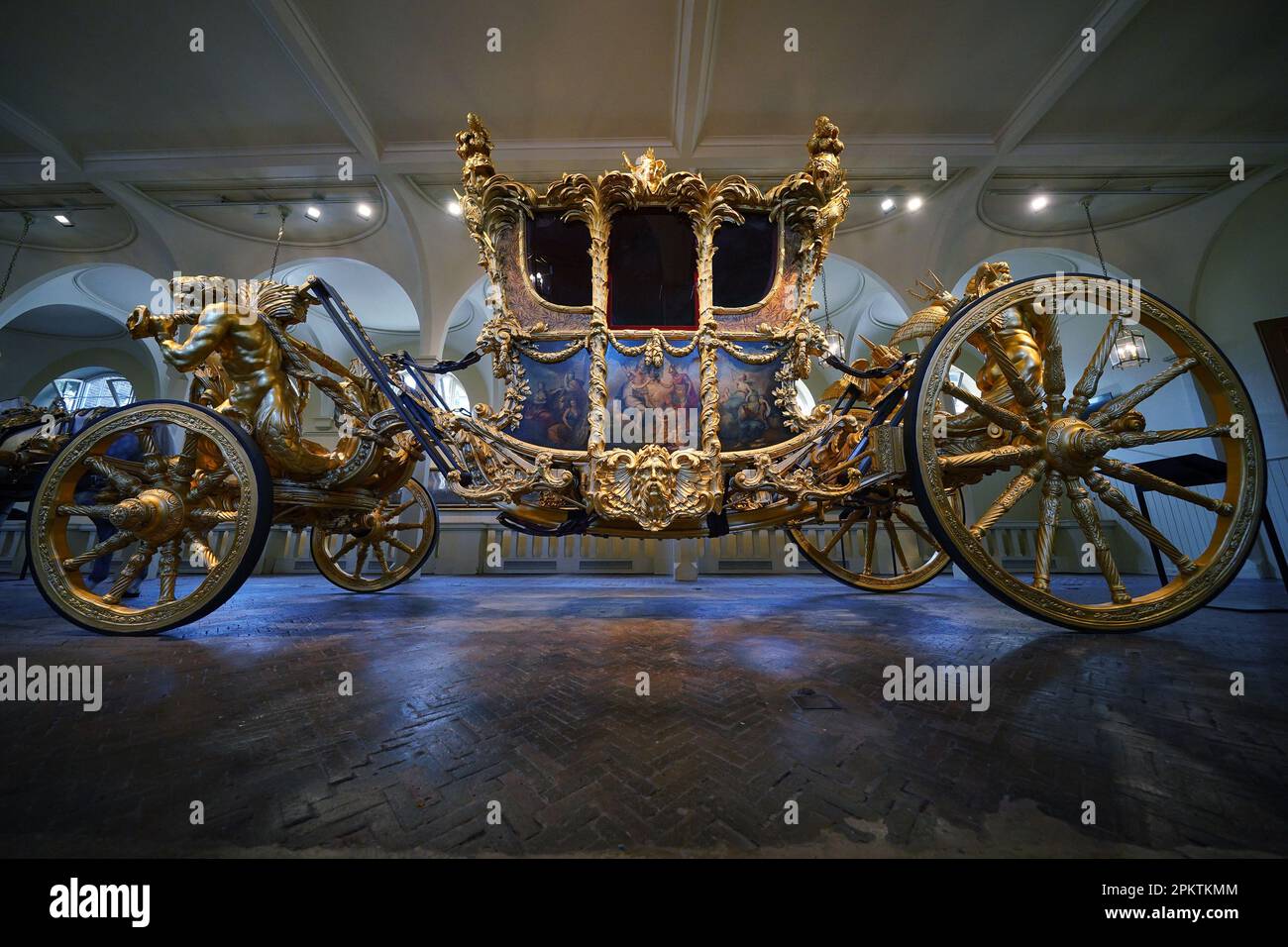The Gold State Coach on display at the Royal Mews in Buckingham Palace ...