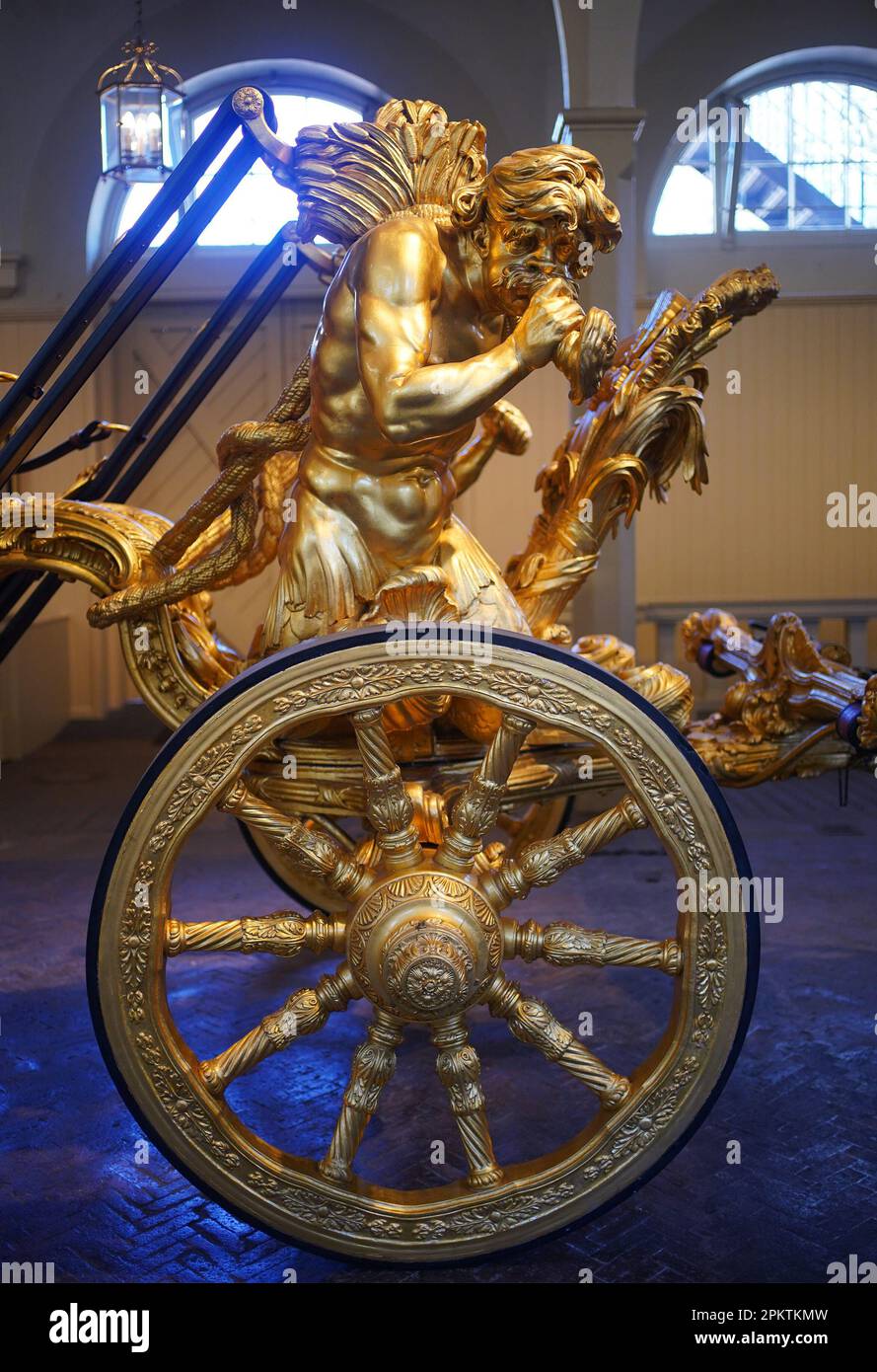 The Gold State Coach on display at the Royal Mews in Buckingham Palace ...