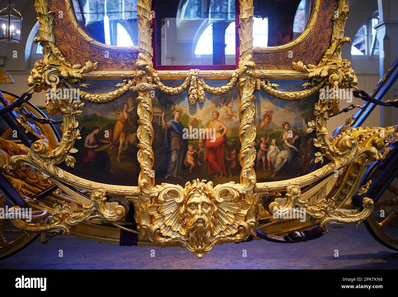 The Gold State Coach on display at the Royal Mews in Buckingham Palace ...