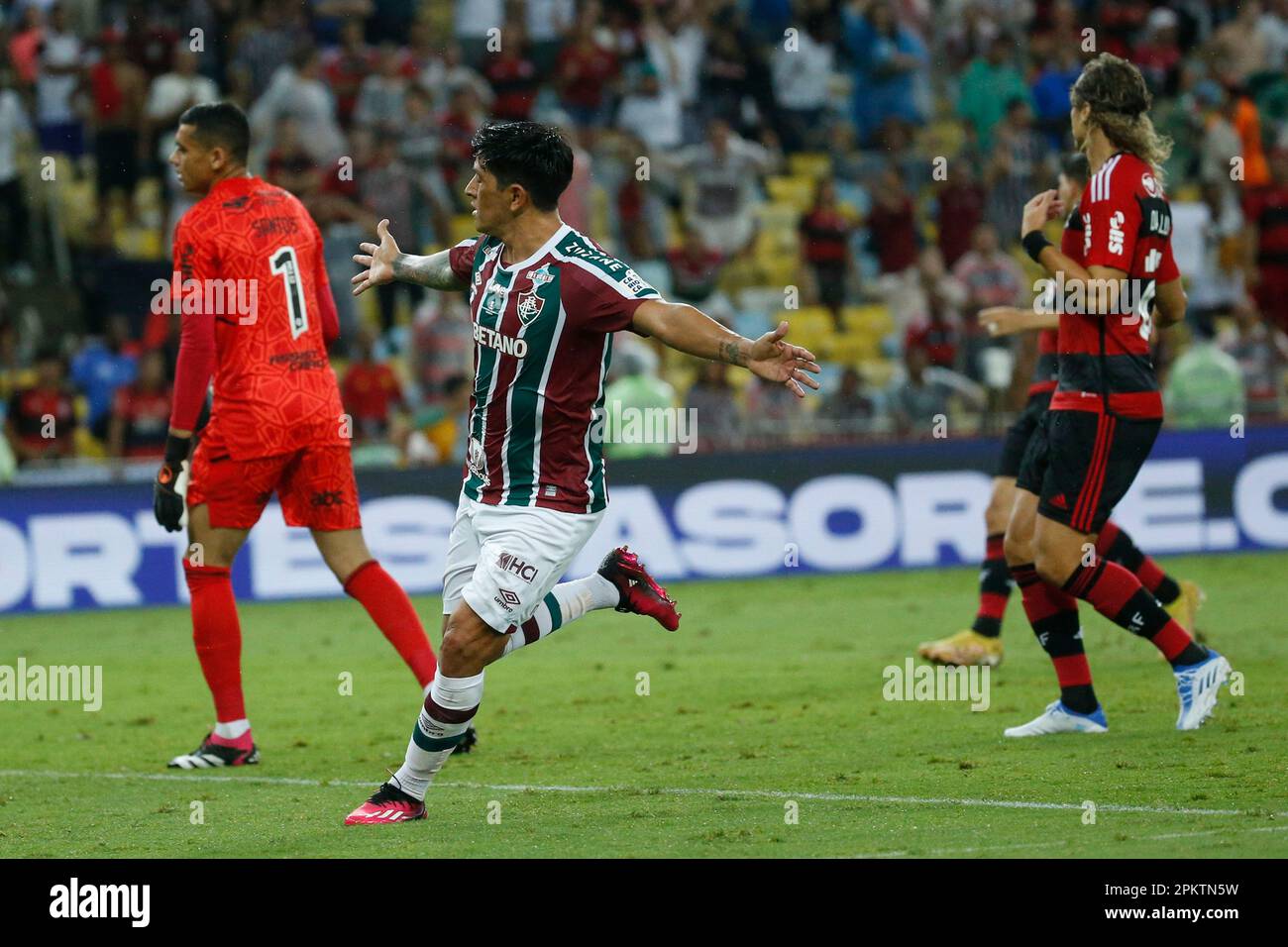 German Cano of Fluminense, center, celebrates after scoring against ...