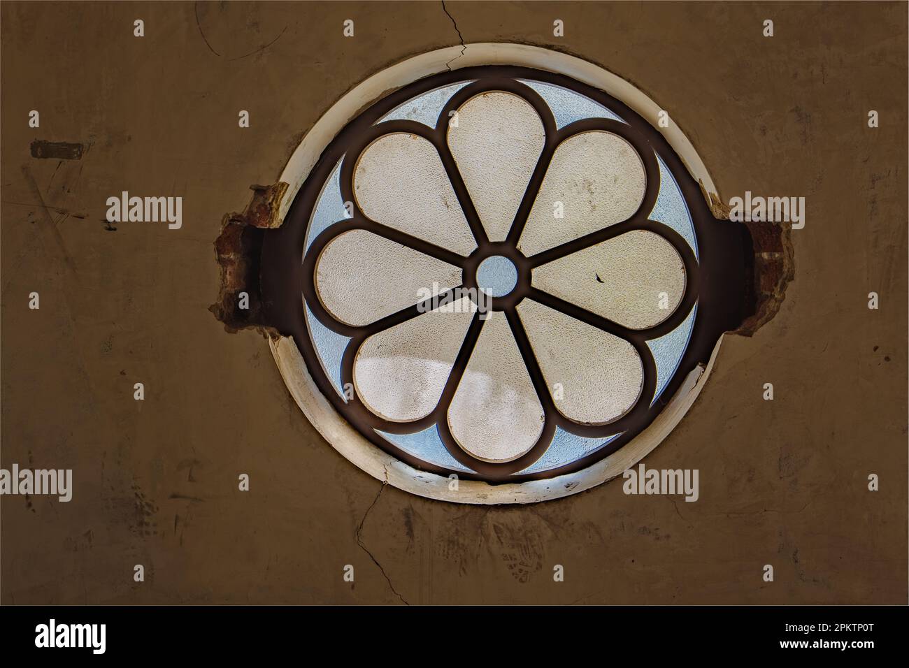 Round stained glass window in old abandoned house Stock Photo - Alamy