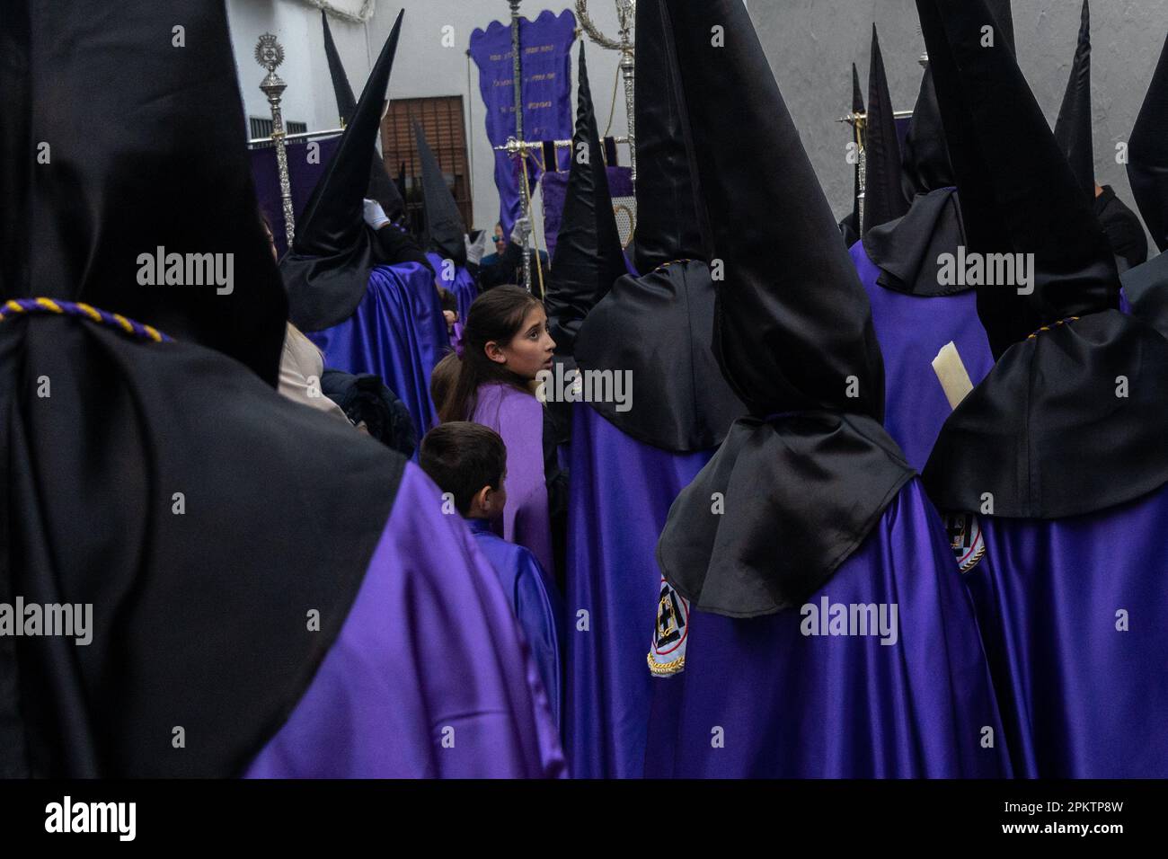 Setenil de las Bodegas, Spain. 08th Apr, 2023. A young girl looks back ...