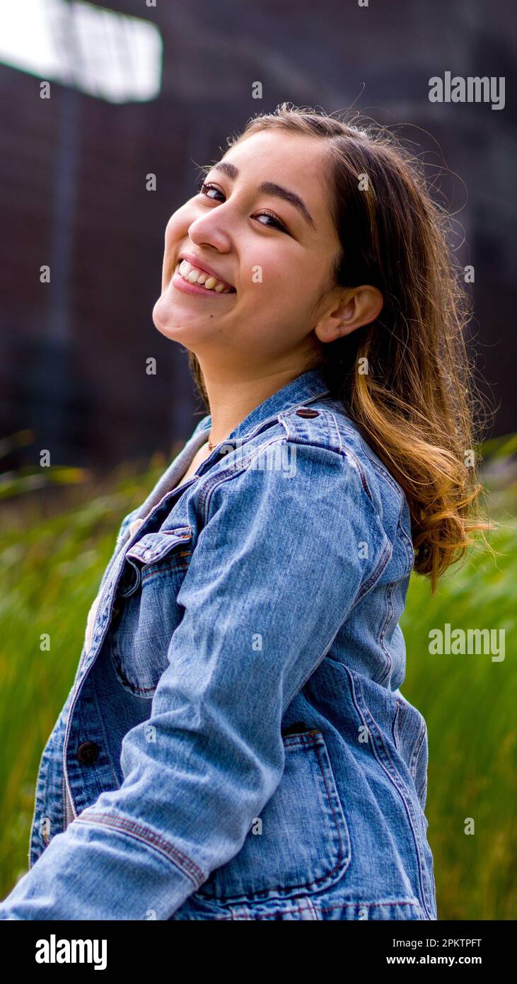 Female Asian Teen Seated Beside a Lily Pond | De Young Museum Stock ...