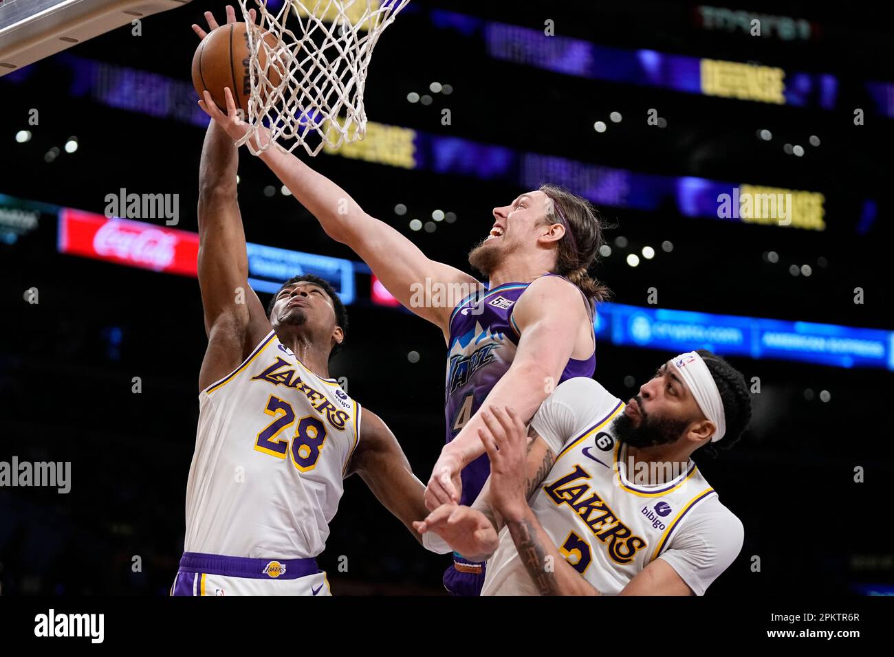 Utah Jazz forward Kelly Olynyk, center, shoots as Los Angeles Lakers ...
