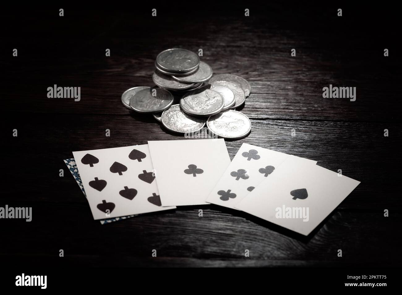Dead man's hand and silver coins bet. Two-pair poker hand consisting of ...