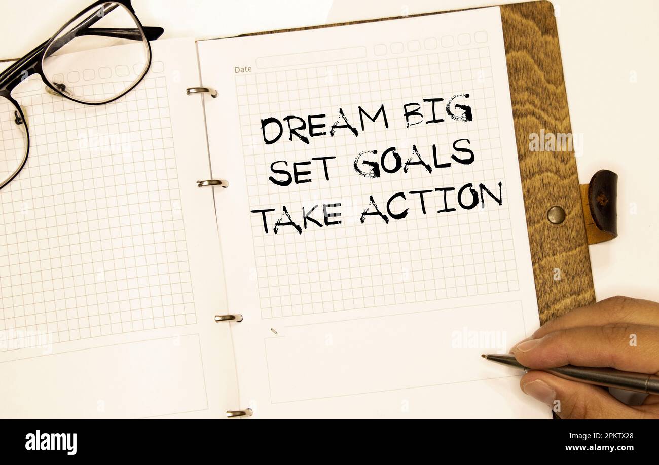 Dream Big Set Goals Take Action text quote on notepad, concept background Stock Photo - Alamy
