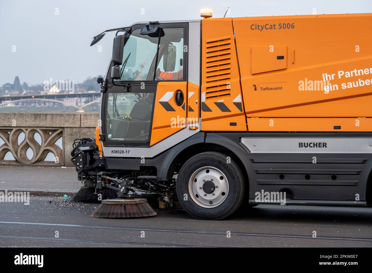street sweeper the next morning cleaning the the confetti off the ...