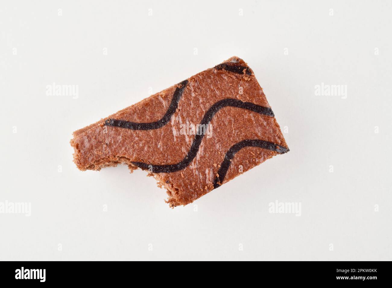 Half eaten piece of cake on white background Stock Photo - Alamy