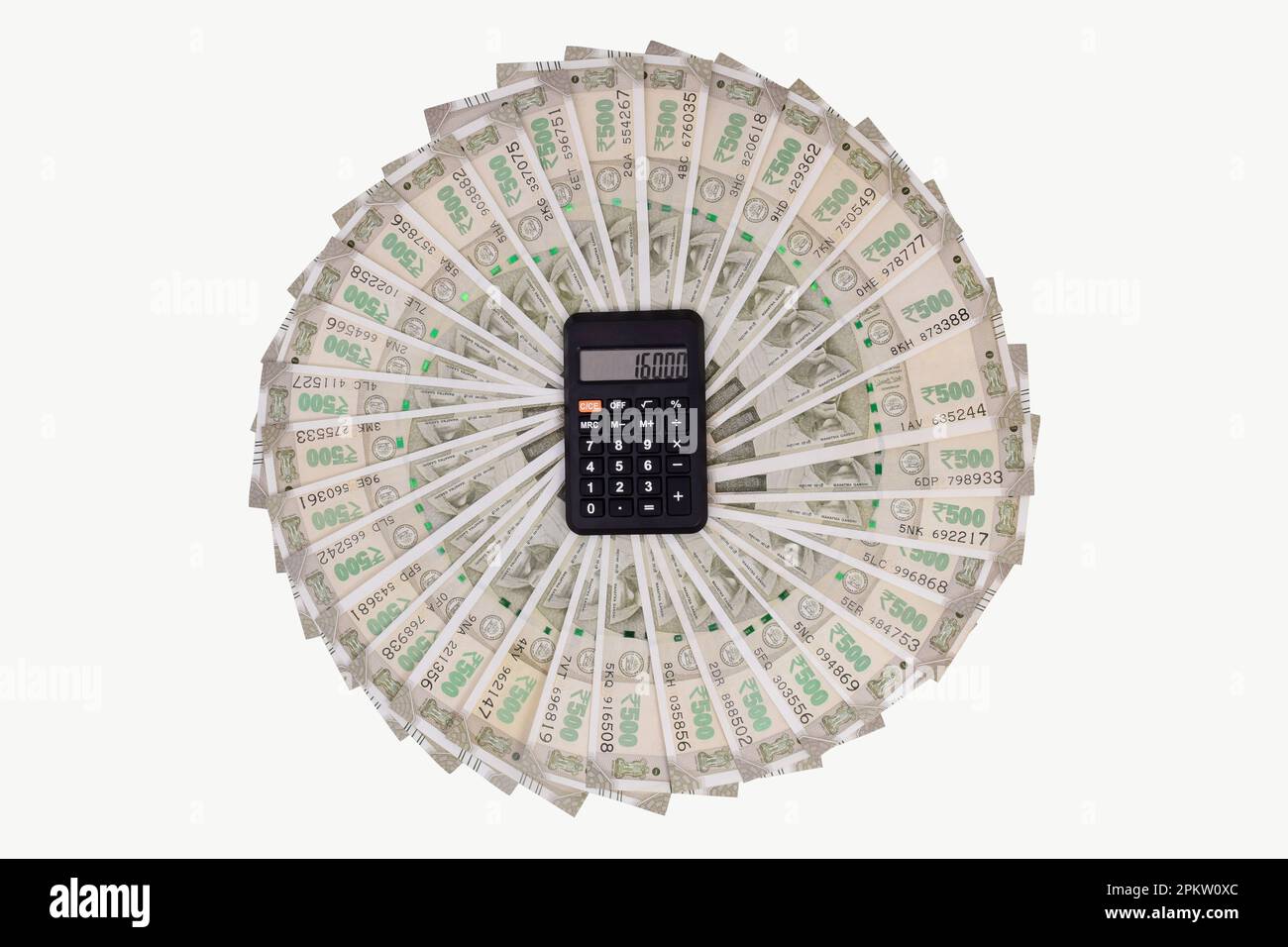 Top view of indian currency with calculator isolated on white ...
