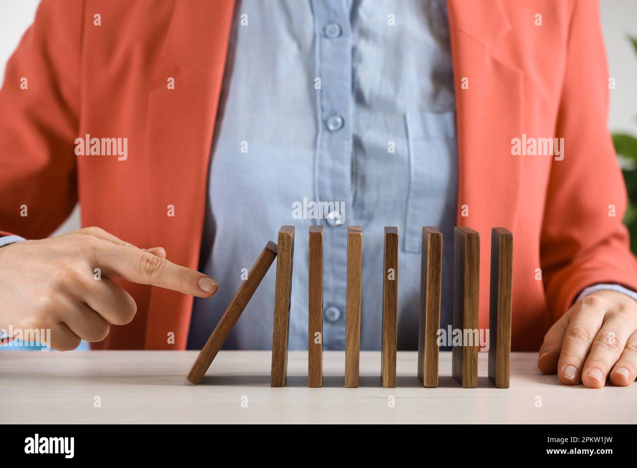 Finger pushing dominoes hi-res stock photography and images - Alamy