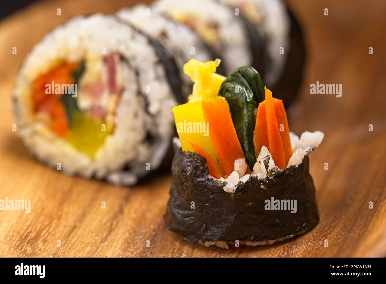 A close up of the end piece of a Korean treat called Kimbap. Food made ...