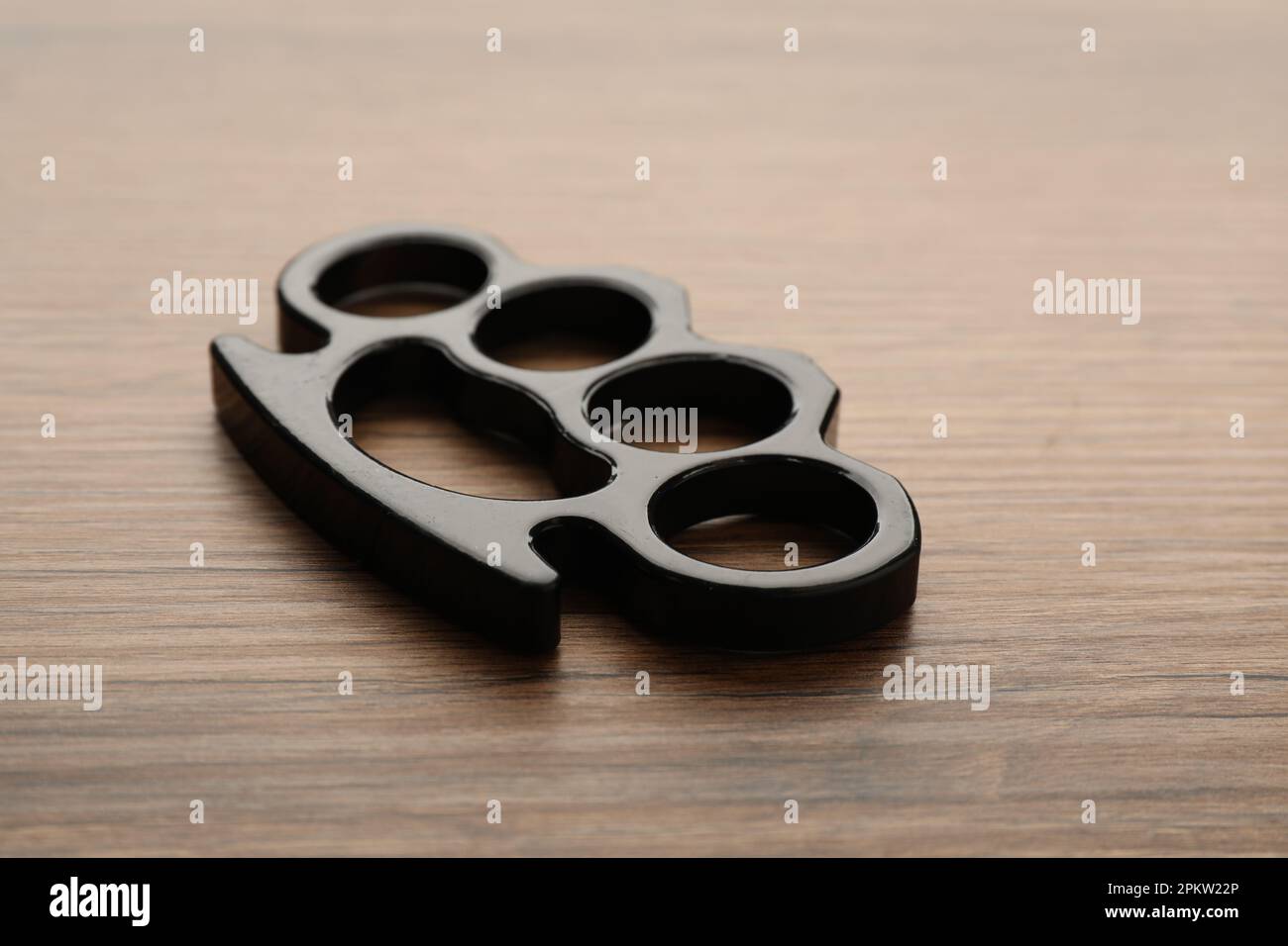 Brass knuckles fist hand hi-res stock photography and images - Alamy