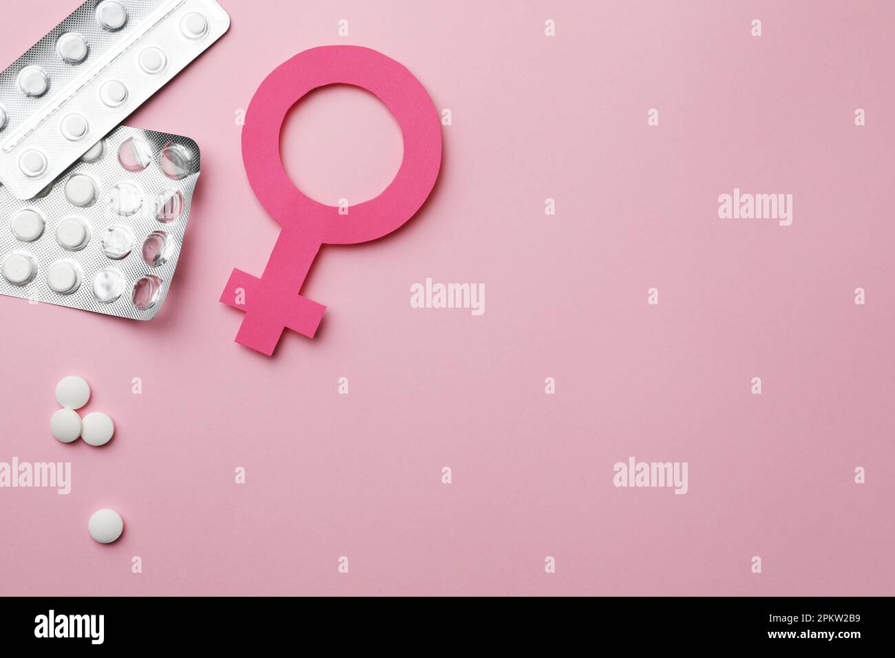 Female gender sign, pills and space for text on pink background, flat ...