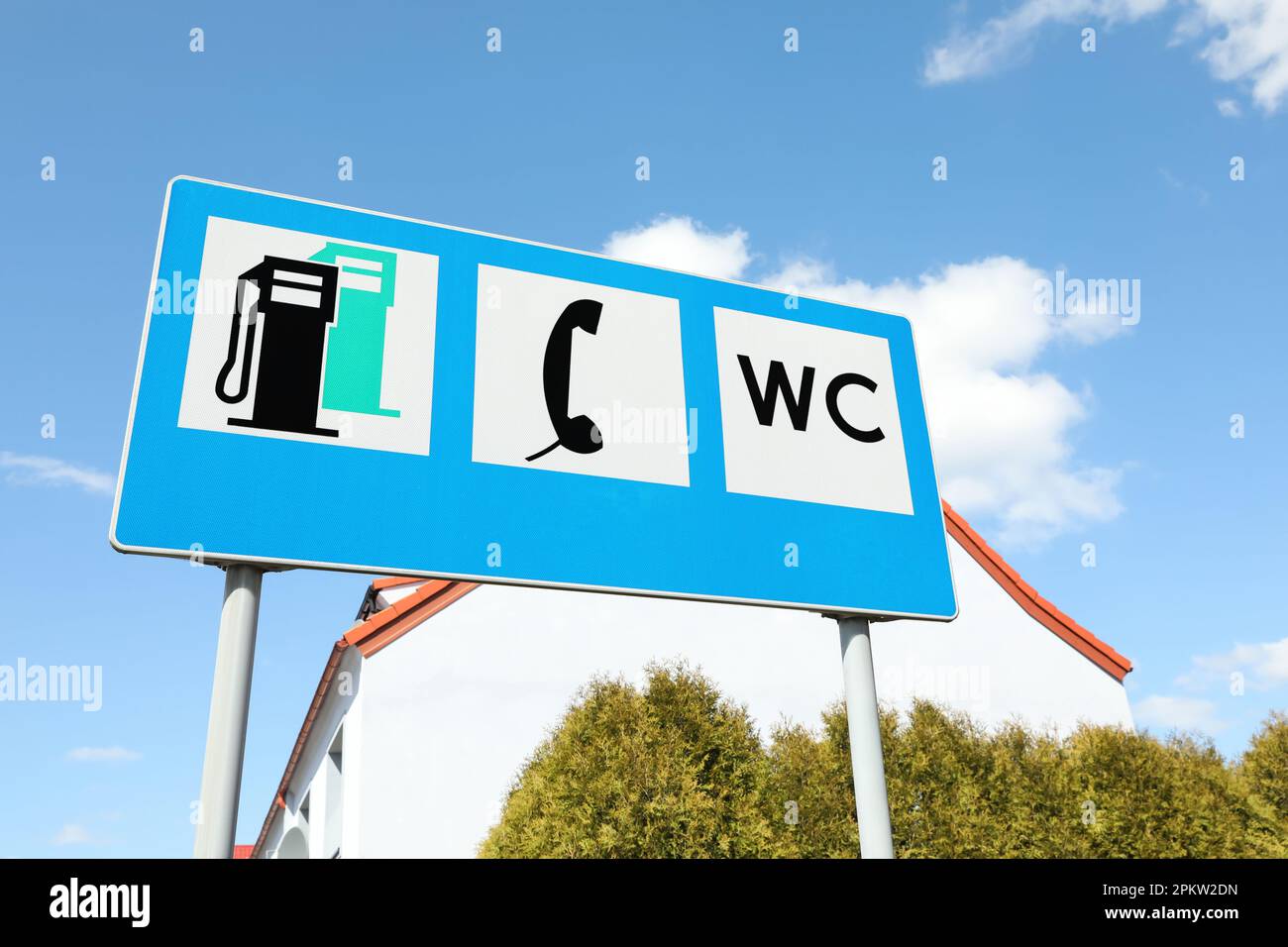 Different traffic signs on city street, low angle view Stock Photo - Alamy