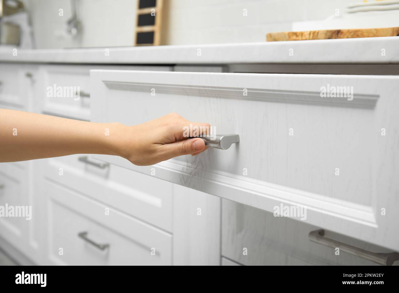 Hand opening drawer in hi-res stock photography and images - Alamy