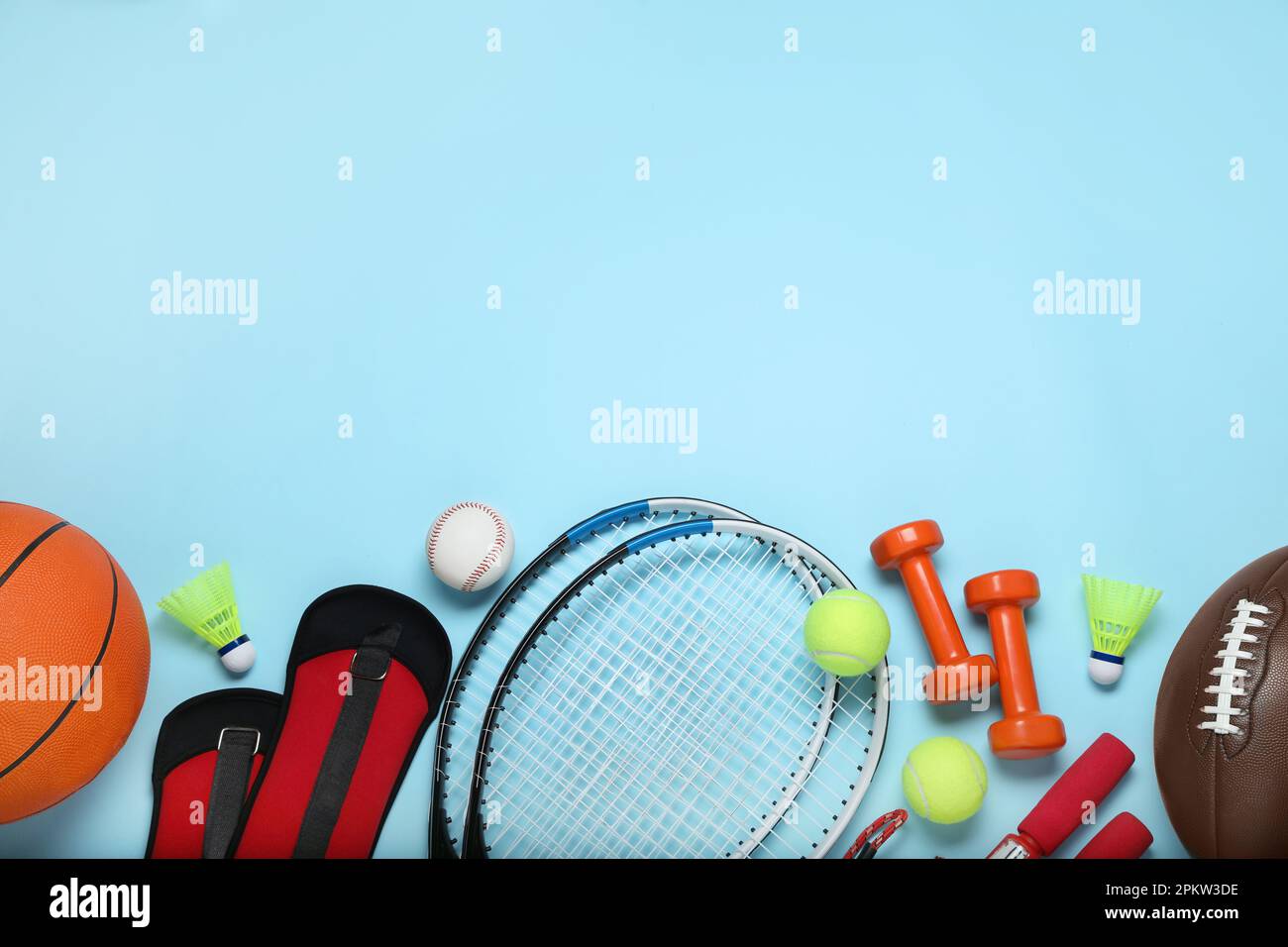 Set of different sports equipment on light blue background, flat lay ...