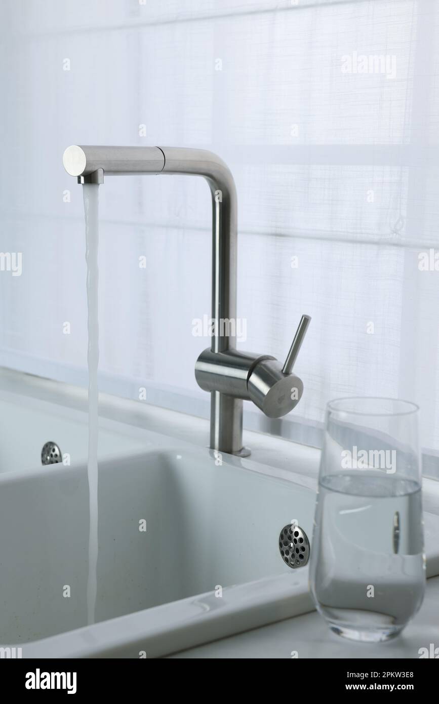 Stream water pouring sink in hi-res stock photography and images - Alamy