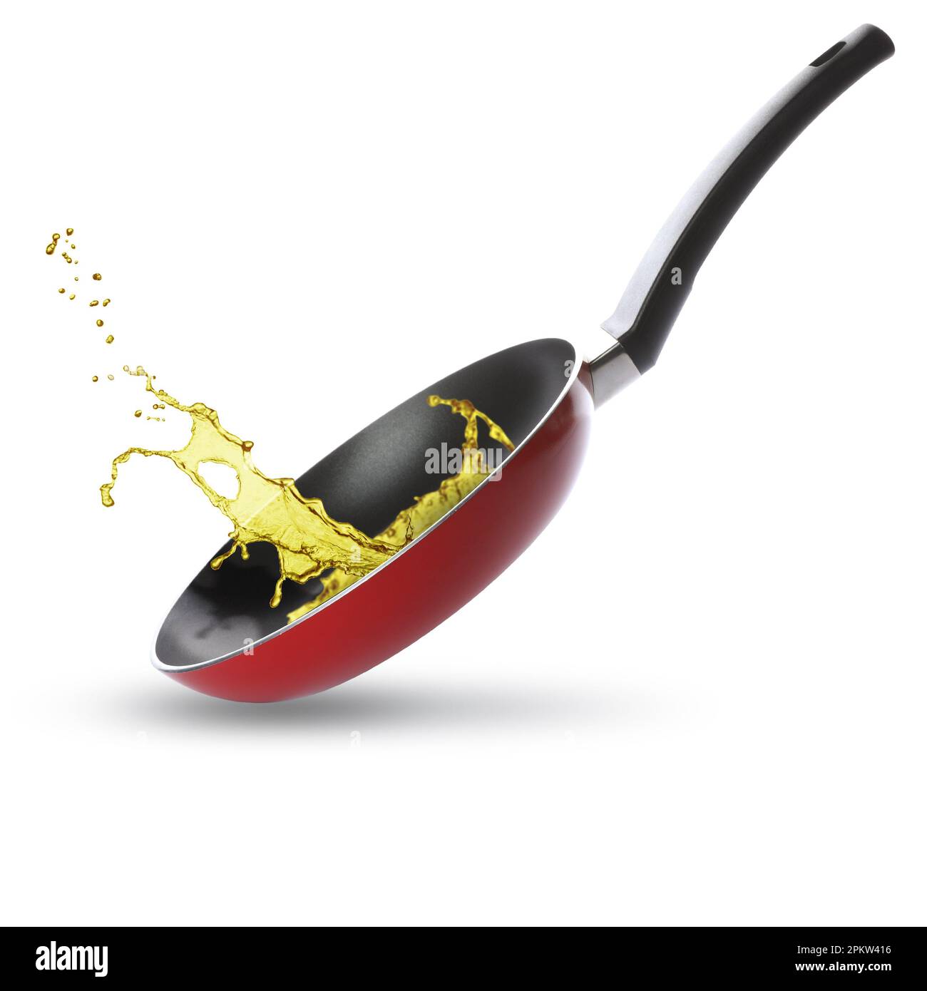 Frying pan and splashing cooking oil on white background Stock Photo ...