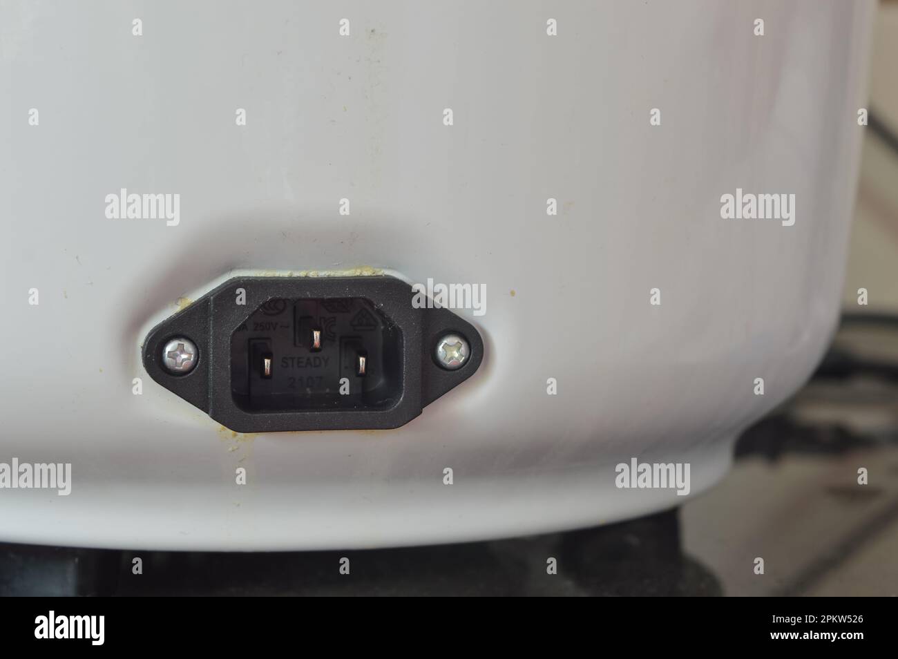 Close up view of rice cooker connection port Stock Photo - Alamy