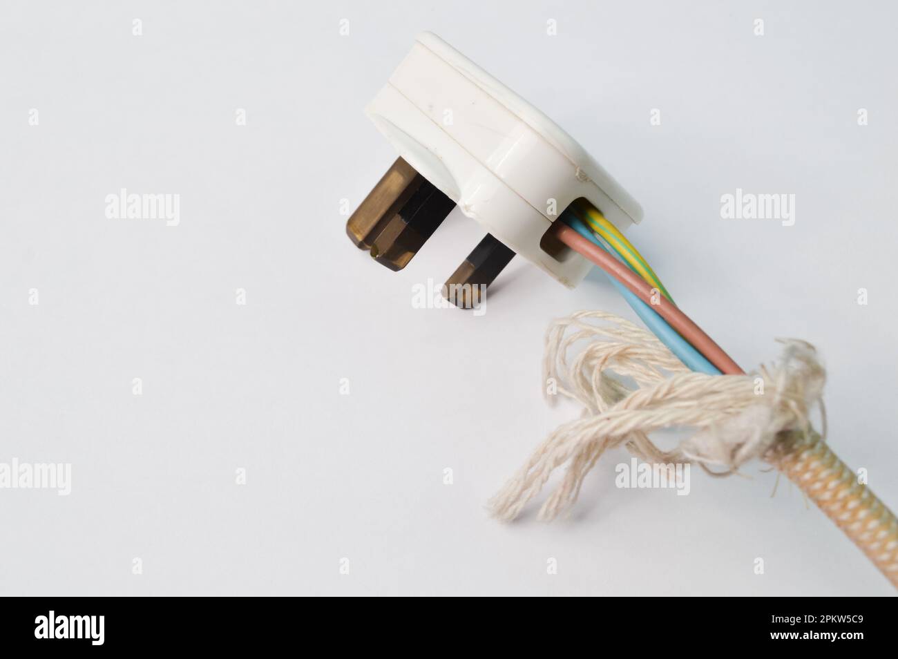 Cover electrical wire torn and damaged isolated on a white background ...