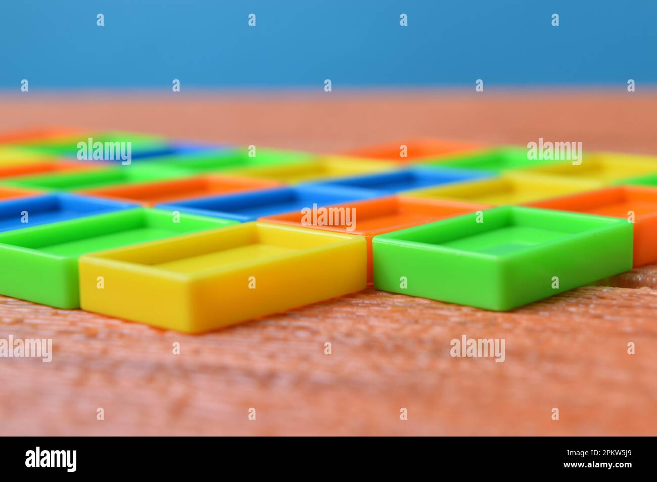 Colorful plastic toy building blocks. Game for development Stock Photo ...